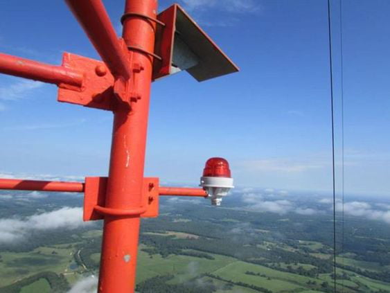 Another image and view from the 600 meters tall guyed tv tower. The trees on the ground are 20 ...