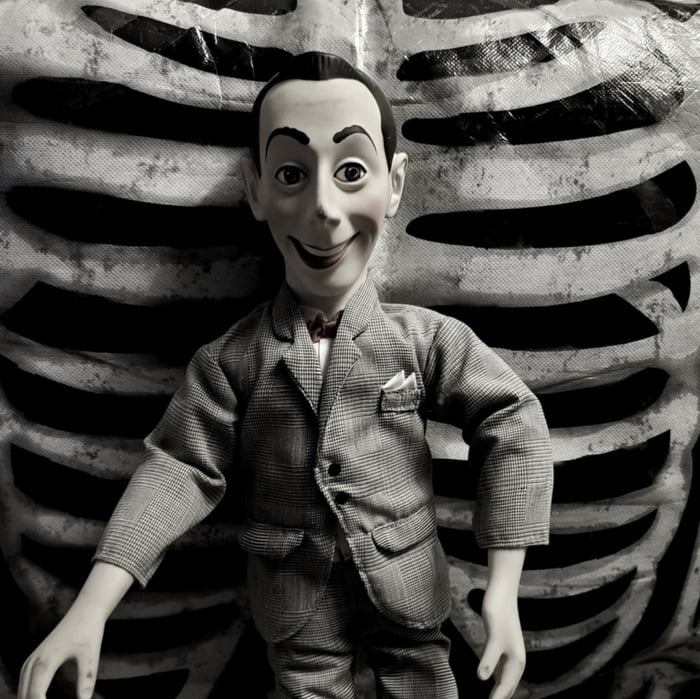 Peewee Herman doll in chair with cheap Dollar Tree Halloween cover - 9GAG