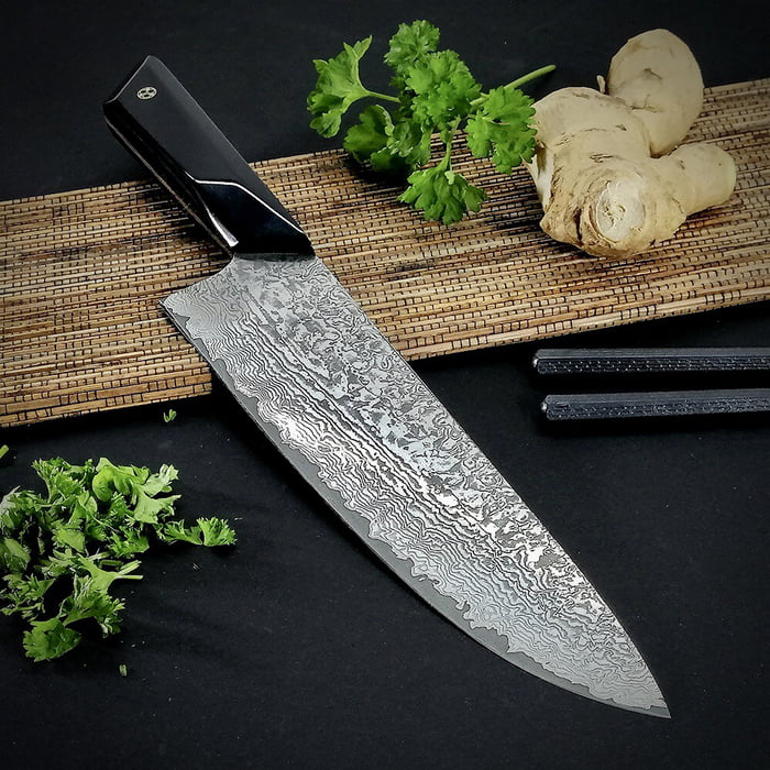 I finally finished my first 67 layered pattern welded stainless steel ...
