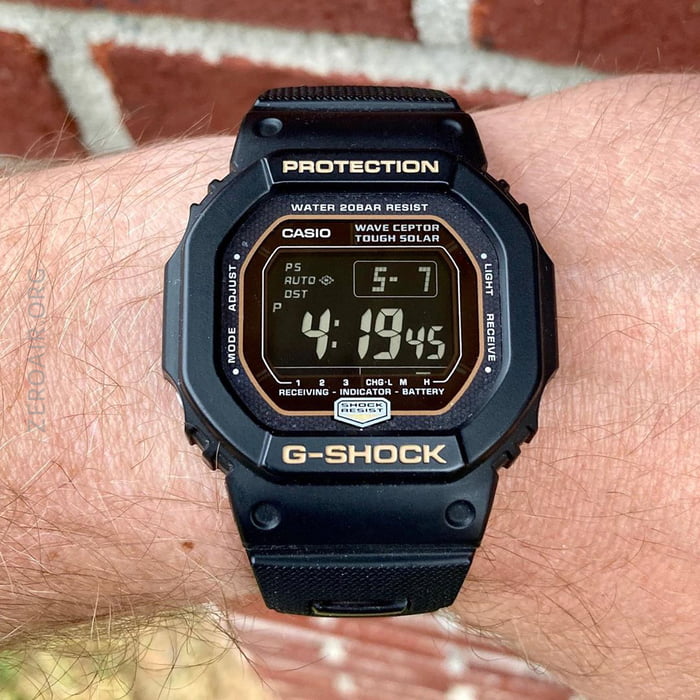 Casio G-Shock GW5600BCJ-1 The G 5600. Negative with orange trim, and a ...