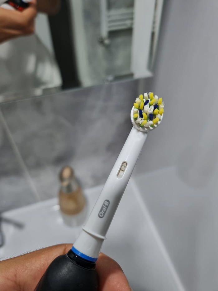 There are holes all over this toothbrush head for some reason, even on ...