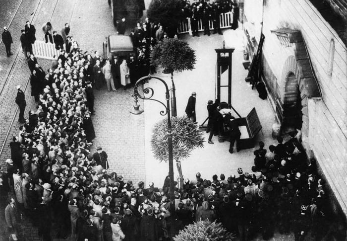 This is a photo of the last public execution in France using the Guillotine, and it was taken in ...