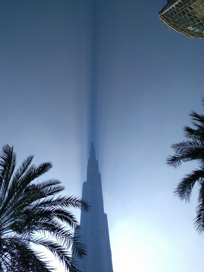 The tallest building in the world creating a shadow in the fog - 9GAG