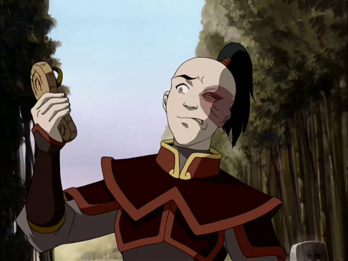 A Chernobyl firefighter is holding a piece of graphite from the reactor ...