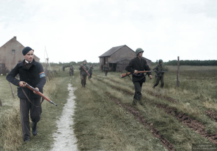 Members of the Dutch resistance guides American soldiers of the 38th ...