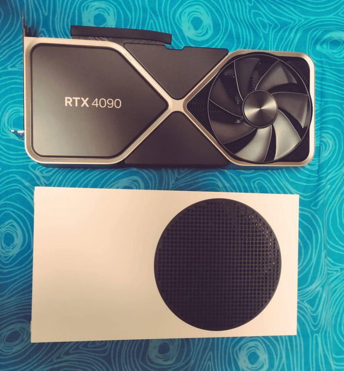 The Dimensions Of The New RTX 4090 Graphics Card Compared To The Xbox The Dimensions Of The New RTX 4090 Graphics Card Compared To The Xbox