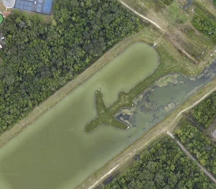 A retention pond outside the Boeing factory in Charleston, SC has a ...