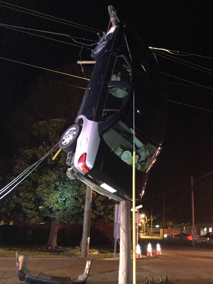 Someone drove their car up a pole - 9GAG