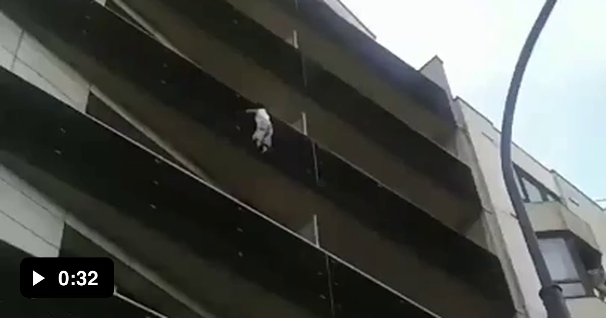 Man scales building to save dangling child - 9GAG