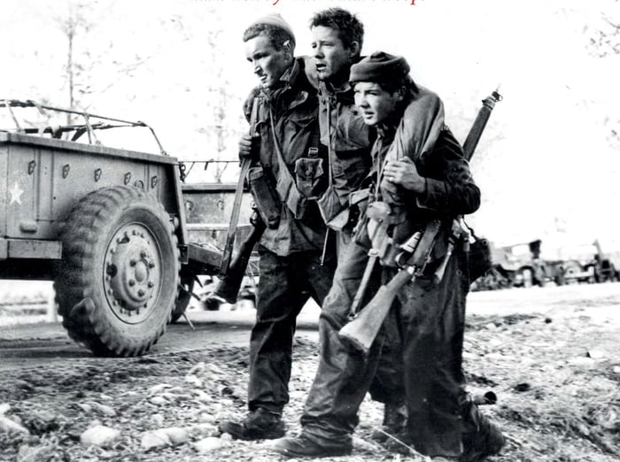 Two Argyll and Sutherland Highlanders assisting a wounded comrade near ...