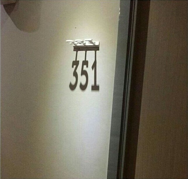 A hotel room number, created by a shadow - 9GAG