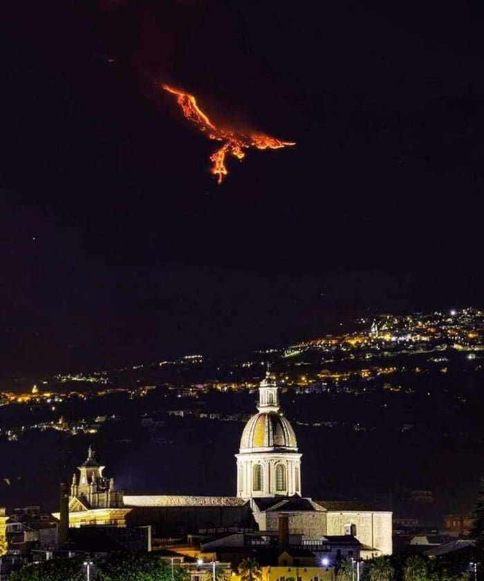 Lava from erupting Etna Volcano appears as a Phoenix in the night sky ...