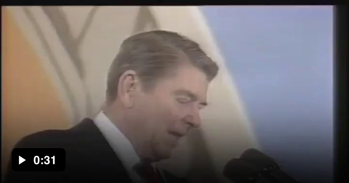 President Reagan reacts to a balloon popping during his speech in 1987 ...