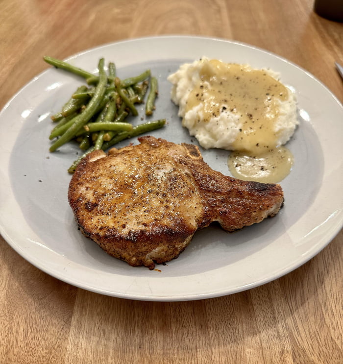 A nice home cooked meal - pork chops, green beans, and mashed potatoes ...