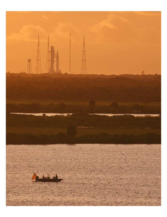 The American flag present aboard a small vessle during the historical ...