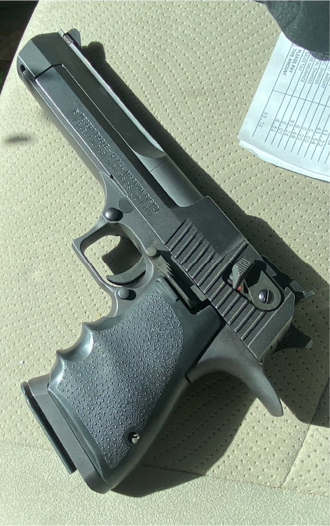 Since it's a trend to show your American owned 44 magnum... I too shall ...