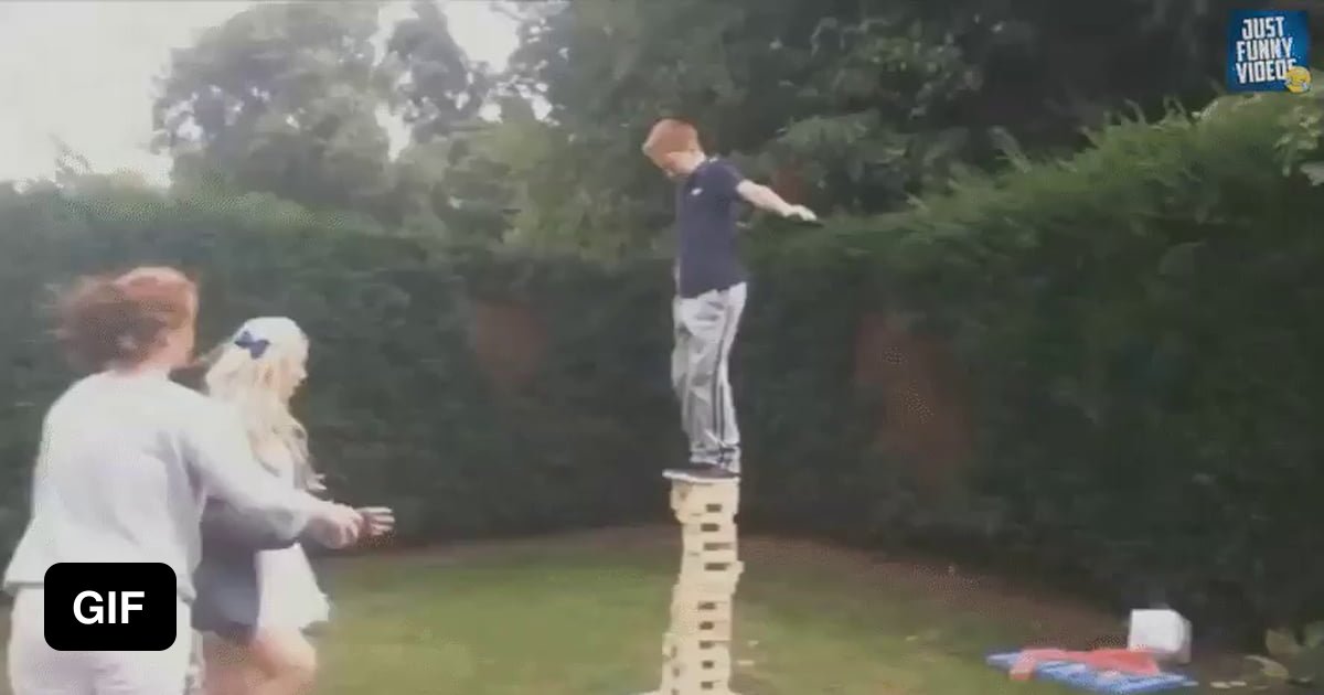 Knocking over a Jenga tower with balls - 9GAG