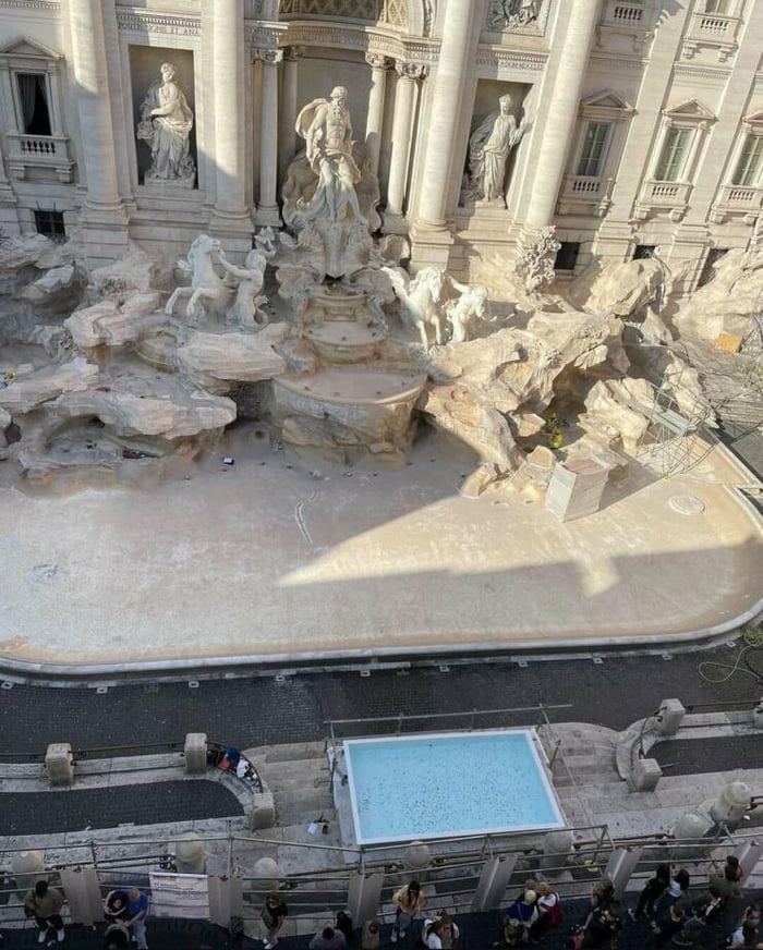The Trevi fountain in Rome has been emptied and a little pool was put ...