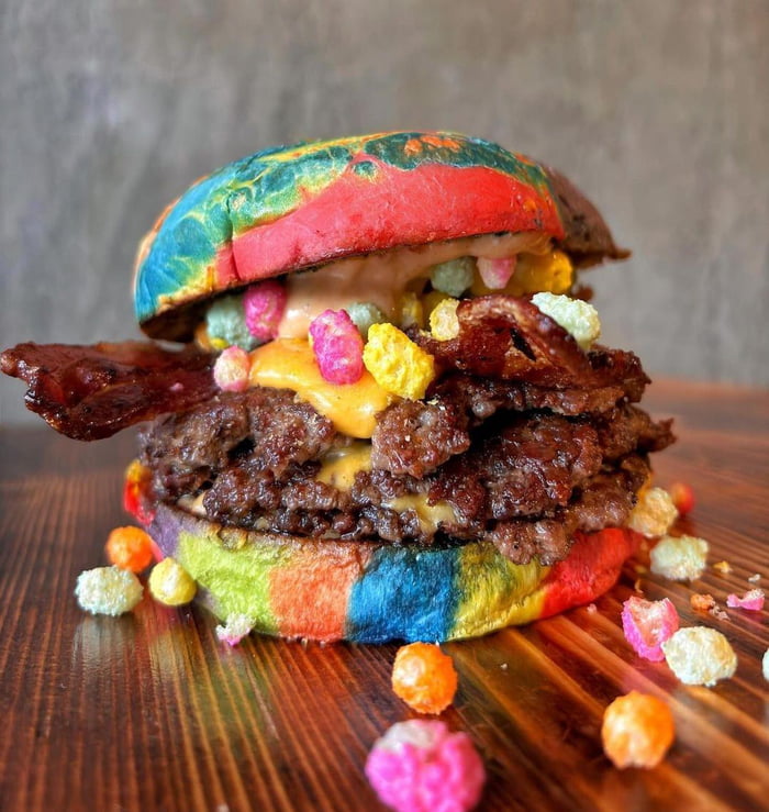 Rainbow burger with rainbow drop sweets in it. - 9GAG