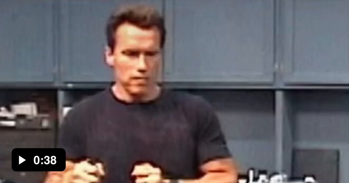 Arnold trying out minigun at Stan Winston's shop. Anybody who carries ...