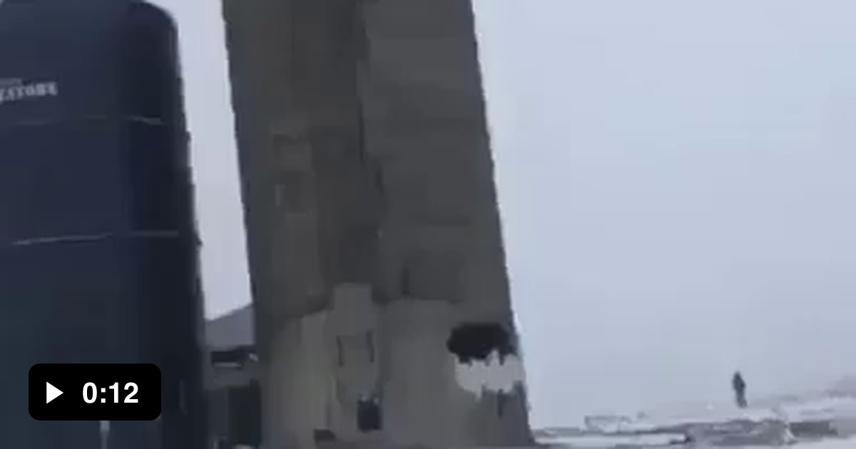 Silo gracefully falls to the ground during demolition - 9GAG