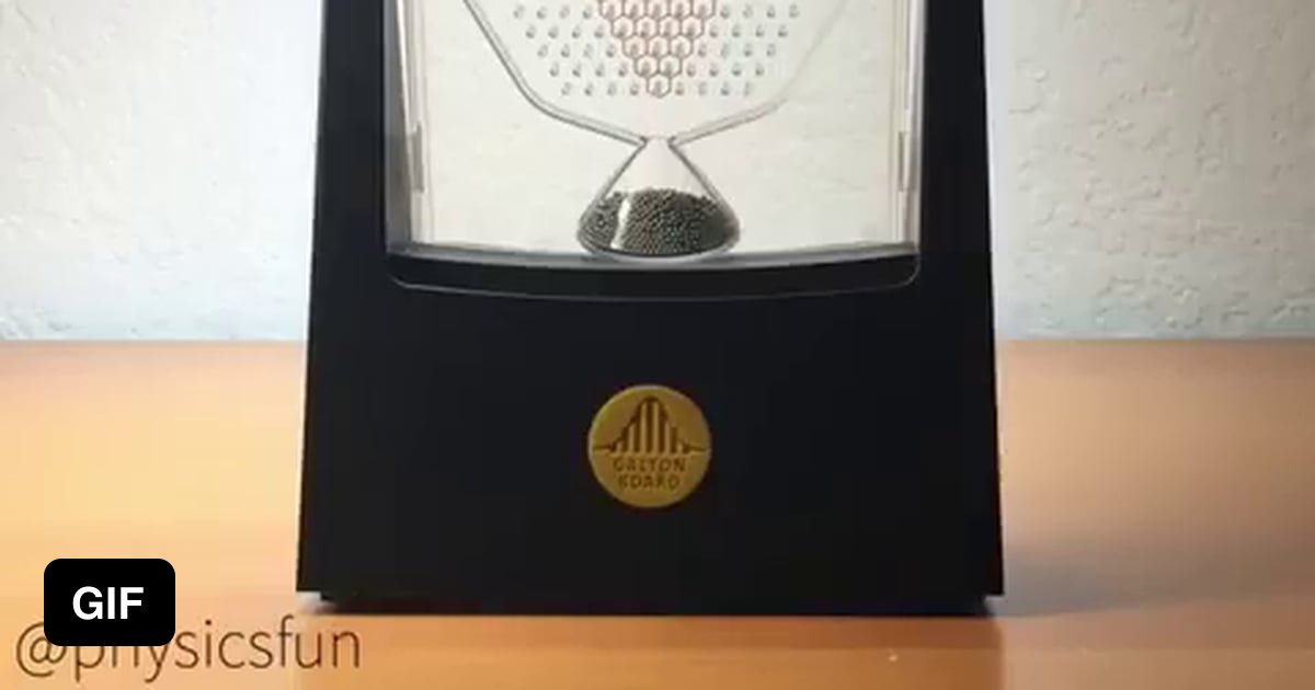 The Galton board: 3000 steel balls fall through 12 levels of branching ...