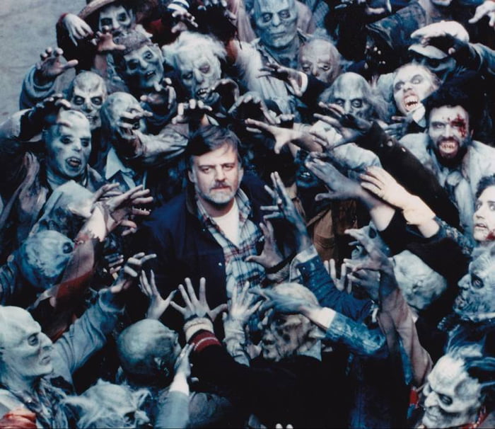 George A. Romero, surrounded by zombies on the set of Day of the Dead ...