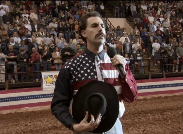 The scene in Borat where he goes to the rodeo and sings the (made up ...