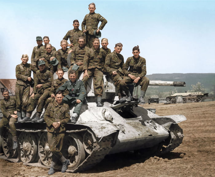 Flemish soldiers of the Langemarck sturmbrigade on a T34 beutepanzer ...