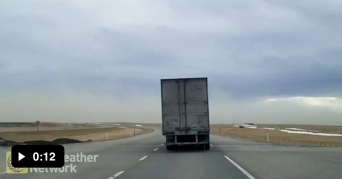 Semi tipped over by strong winds - 9GAG