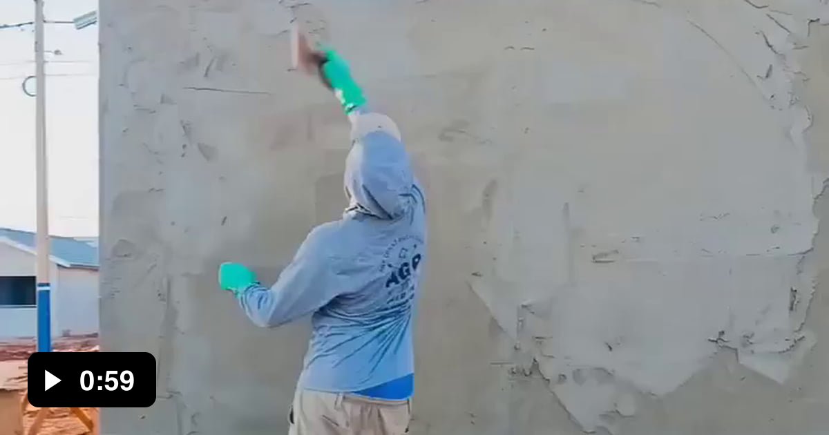 This guy throwing cement onto a wall. - 9GAG