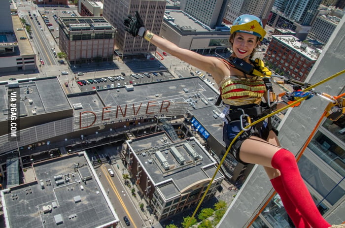 Rappelling off a 32 story building dressed as Wonder Woman. - 9GAG