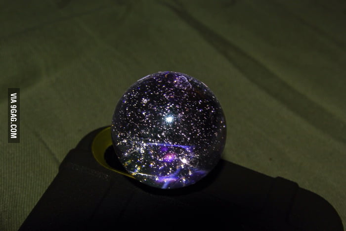 So I had a marble and my phone's flashlight, I think I created a mini ...