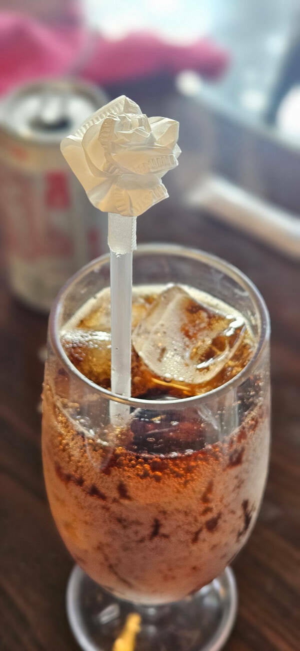 Recycling: straw wrapper flower served at a Japanese restaurant. - 9GAG