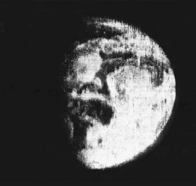 The first ever photograph of earth kinda looks like a face in pain - 9GAG