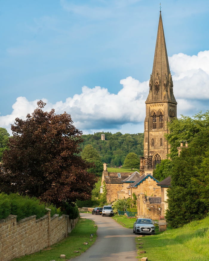 A charming view of the village of Edensor and its beautiful church ...