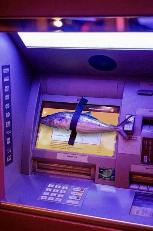 A fish taped to an atm. I was told I should post this - 9GAG