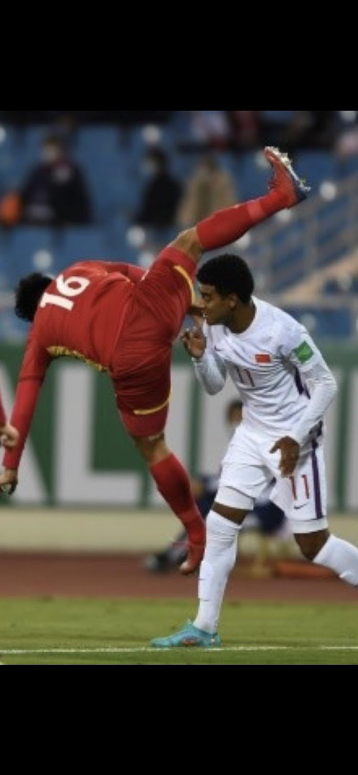 Athlete jumps in shock after unannounced Covid " temperature check" by Chinese official . - 9GAG