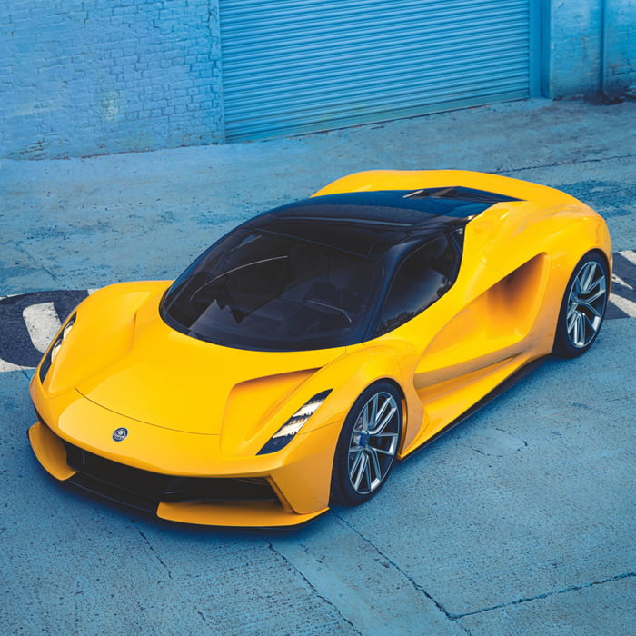 Lotus Evija looking stunning in orange - 9GAG