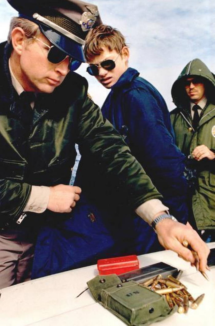 Wichita police officer Terry Morrow empties the pockets of James Alan ...