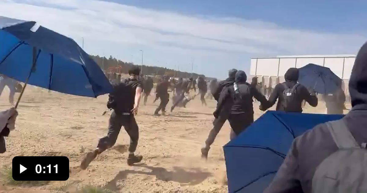 Leftist radicals storm Tesla factory near Berlin, shouting "Destroy ...