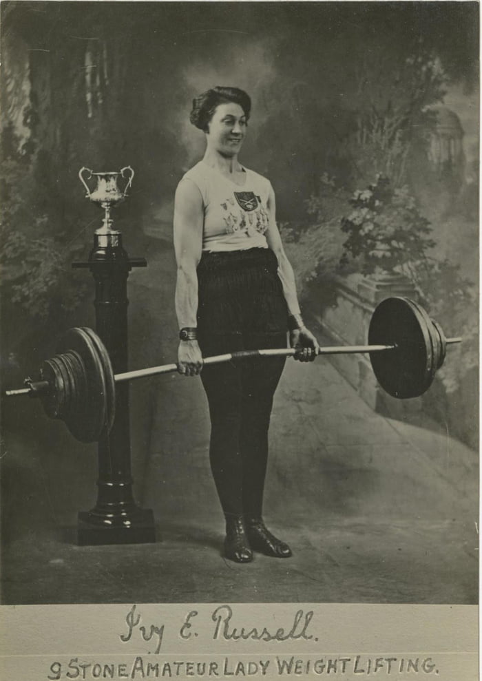 British champion weightlifter Ivy Russell, poses with her trophy after ...