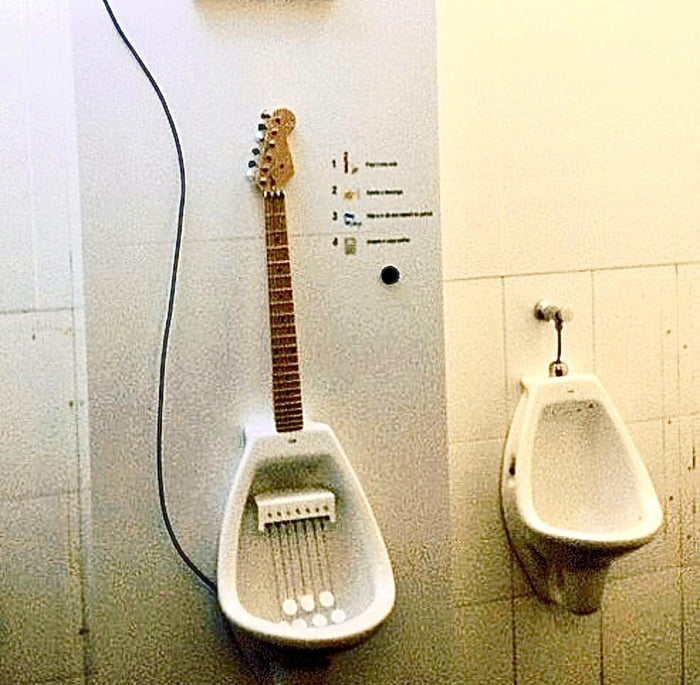 Urinal in NASHVILLE, that allows you to urinate to play a guitar! - 9GAG
