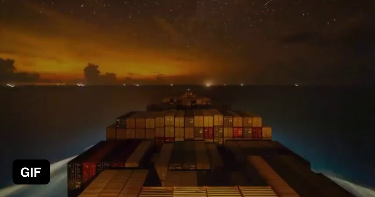 Time lapse of a container ship coming into port and taking on more ...
