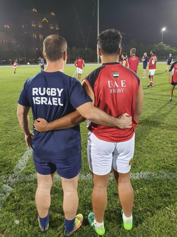 Arm in arm, an Emirati rugby player and an Israeli rugby player ...