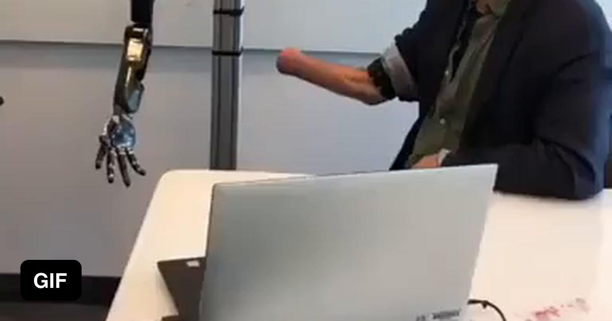 This robotic arm obeys him well, even though it is at a distance. - 9GAG