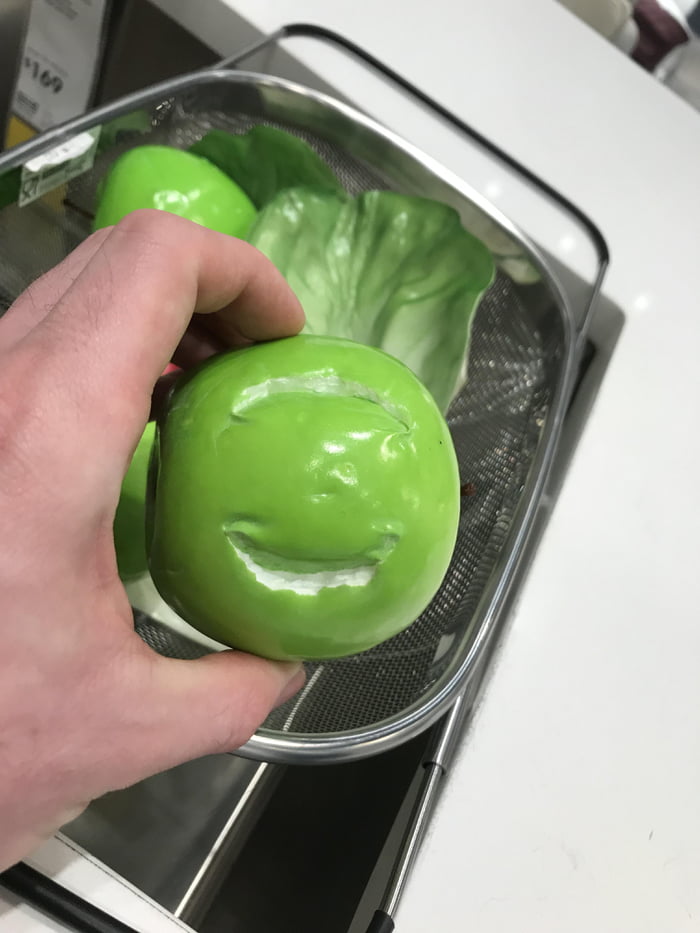 Someone took a bite out of this fake apple at IKEA. - 9GAG