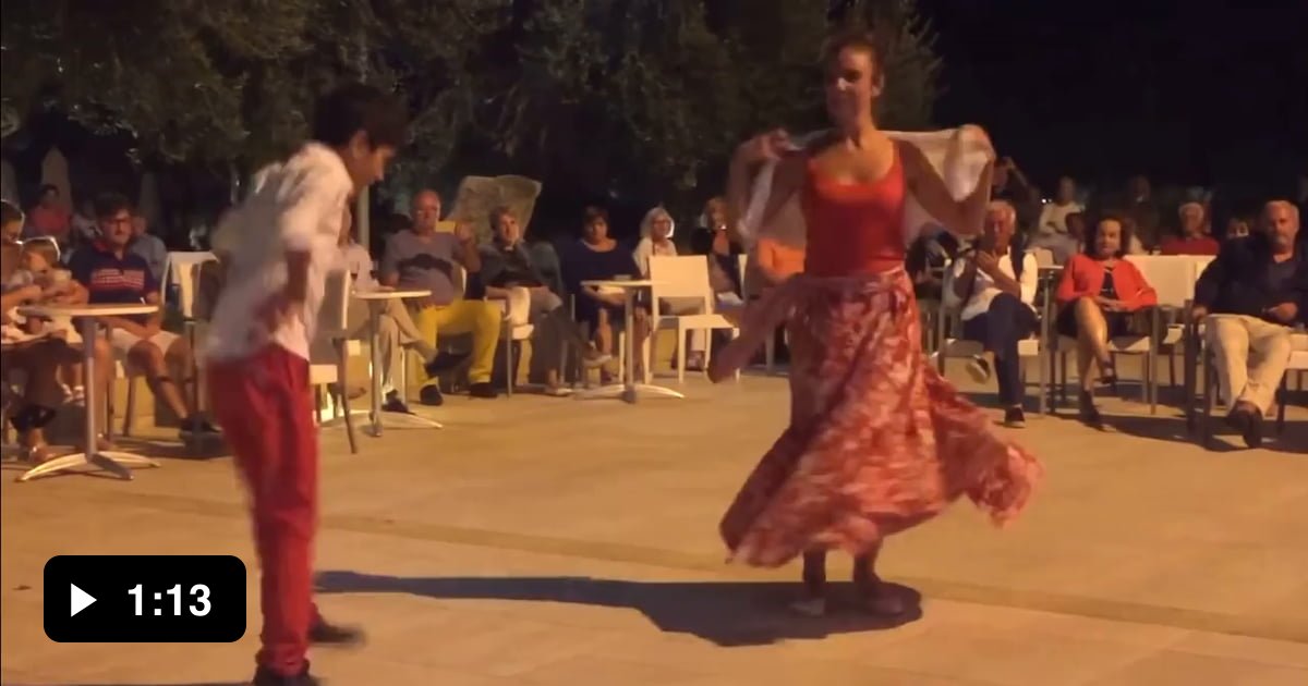 A young boy and a girl dancing Pizzica, an ancient Italian folk dance ...