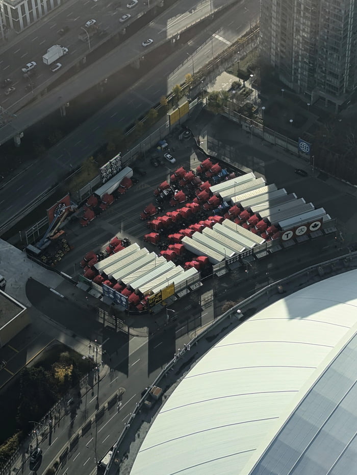 Eras Tour trucks parked outside Rogers Centre - 9GAG
