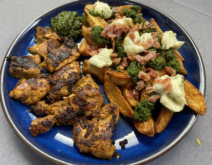 Peruvian chicken, potato wedges with garlic and dill mayonnaise and a ...